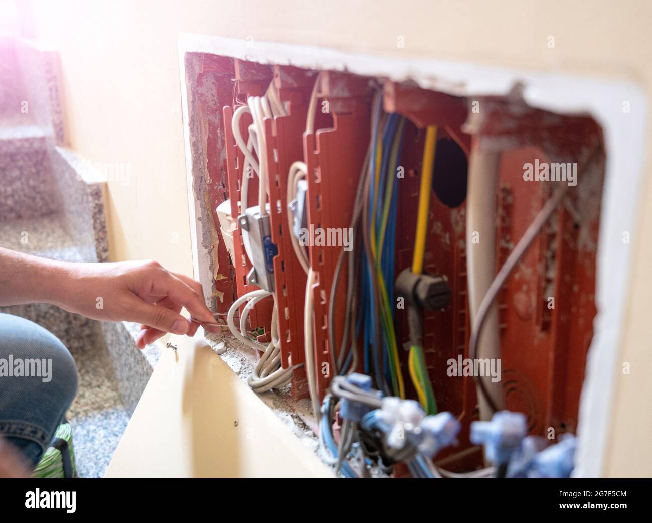 A telephone junction box has been opened: a technician from the network ...