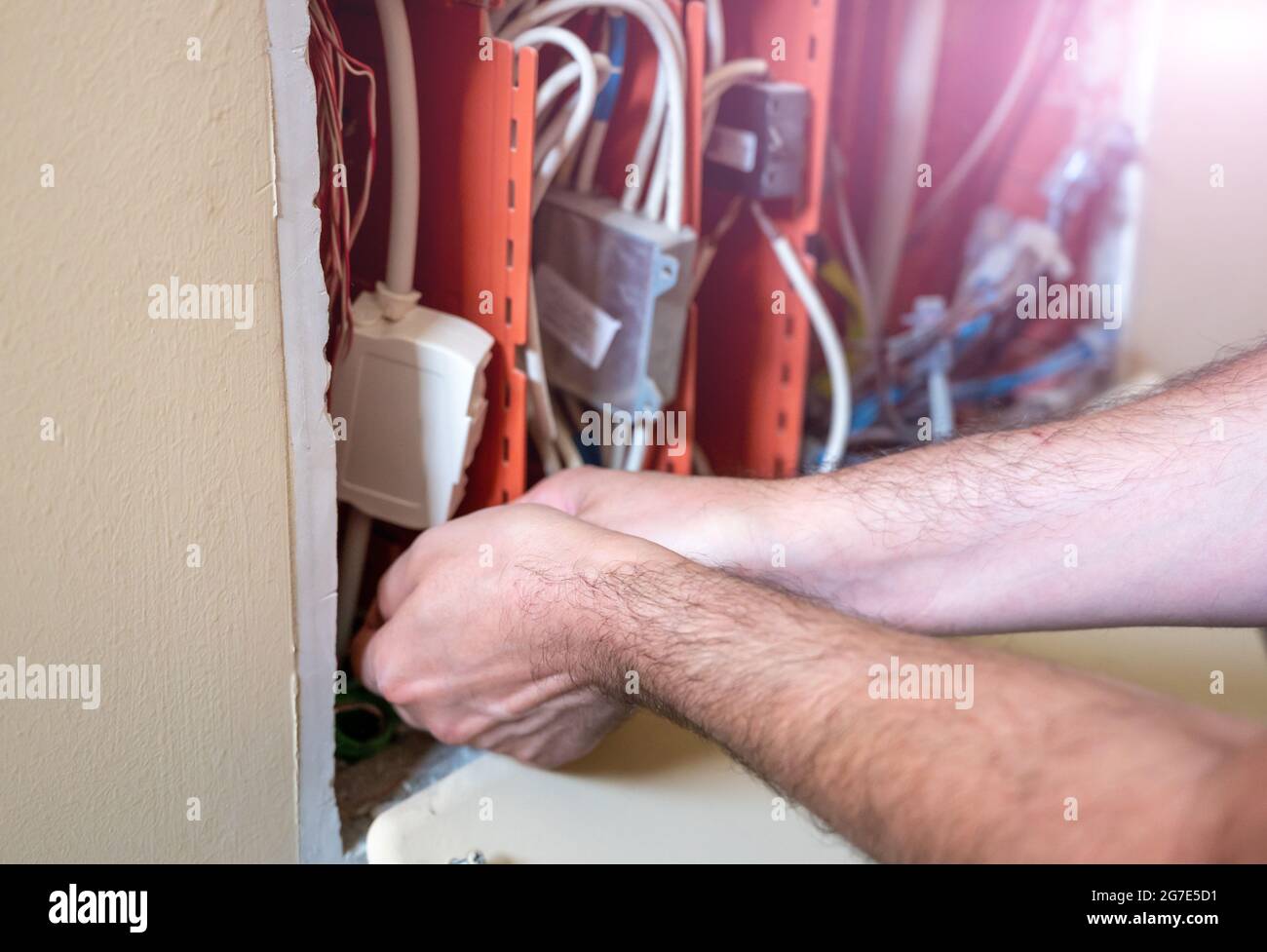 A telephone junction box has been opened: a technician from the network ...