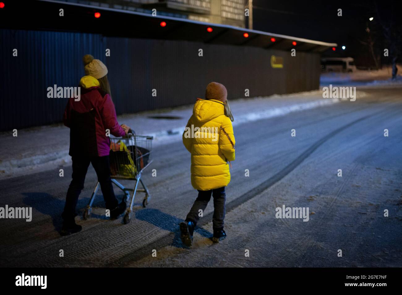 The family goes shopping in winter. Life in the ghetto. Teenagers with ...