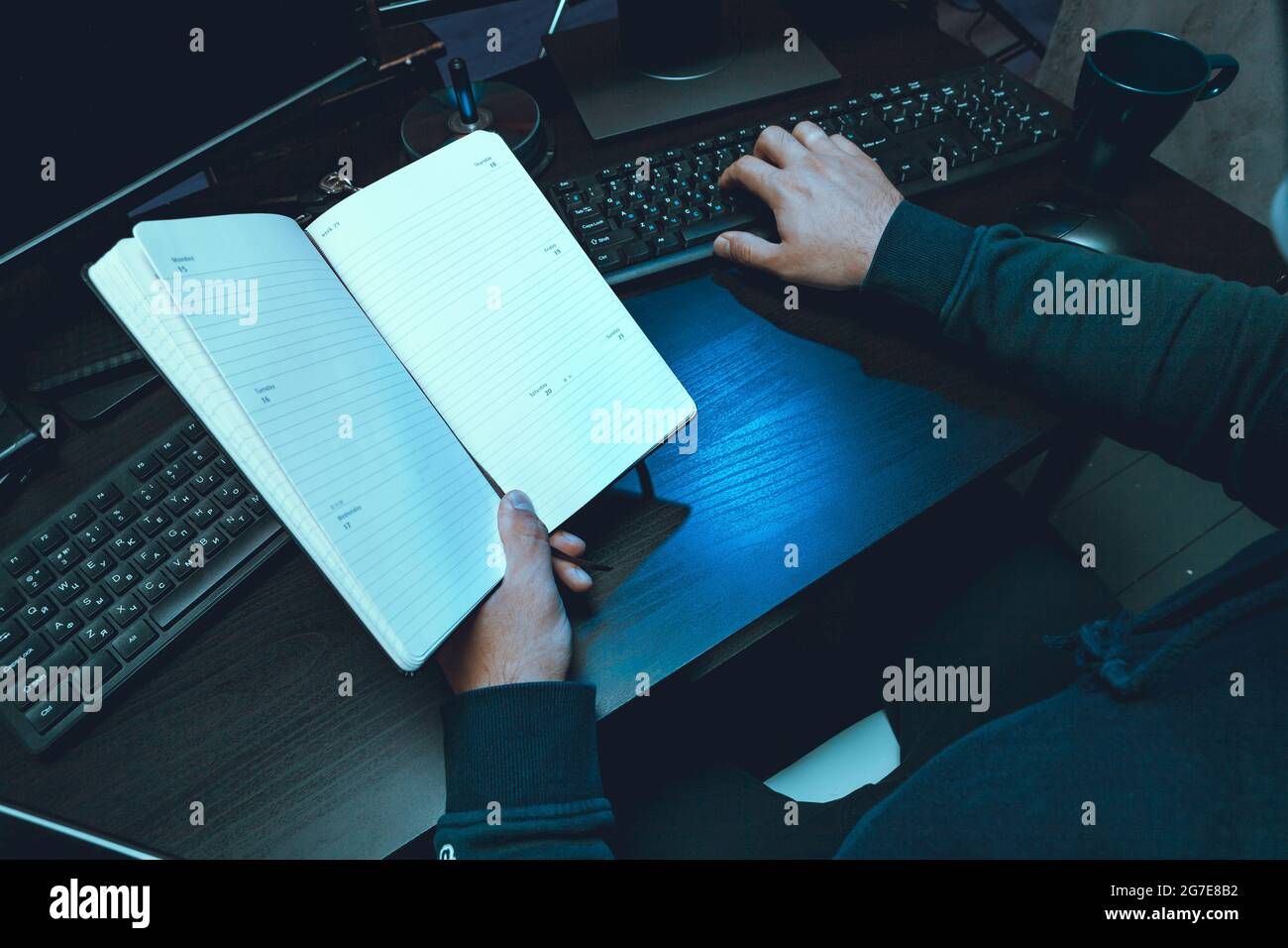 Close up of programmer of hacker hands typing a code Stock Photo - Alamy