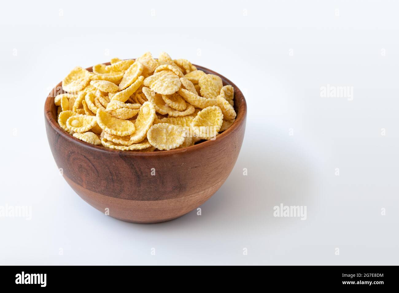 corn flake in bowl and empty space for text isolated on white ...