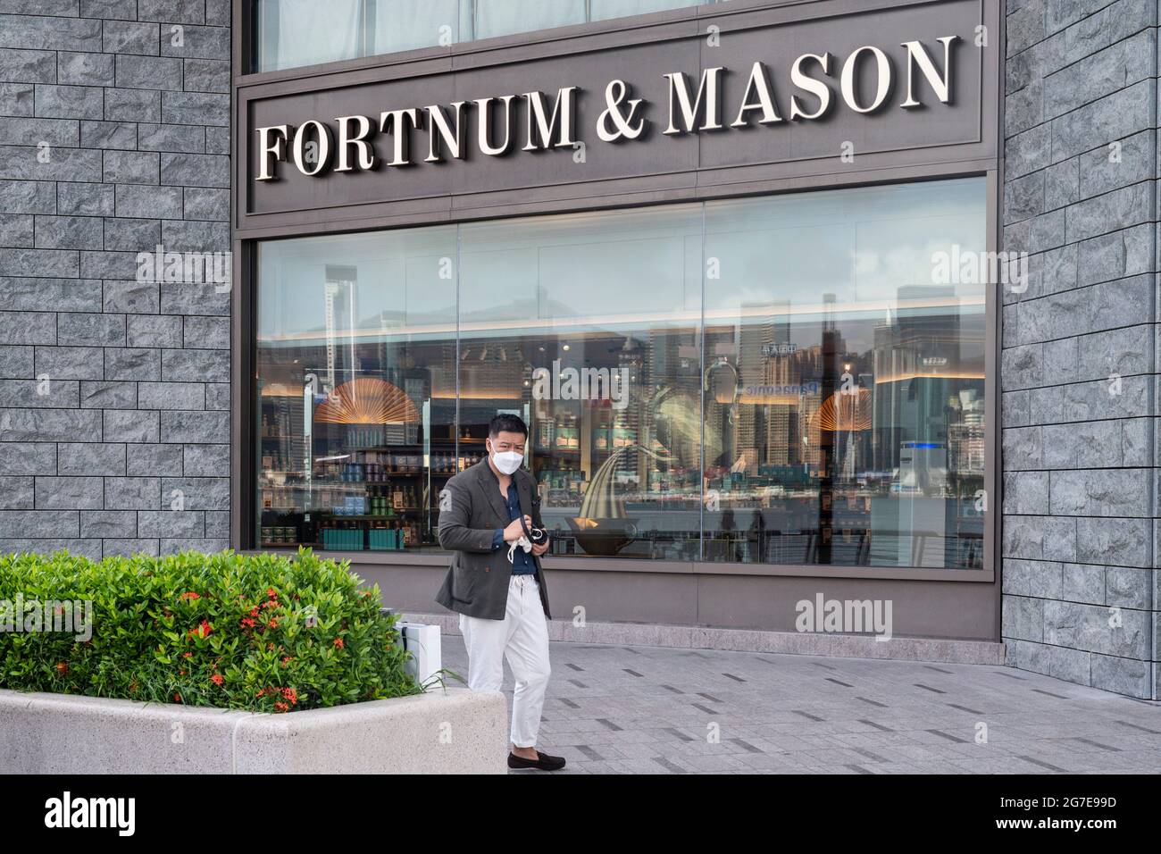 A man seen in front of the British food department company Fortnum ...
