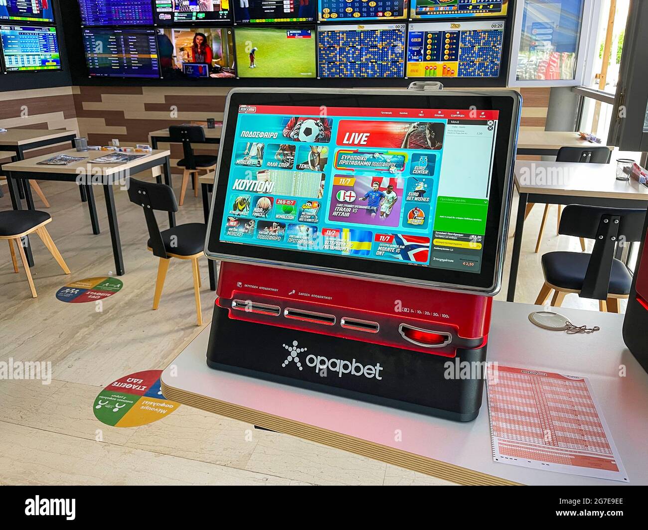 OPAP betting stores reopen with enhanced hygiene measures. Interior ...