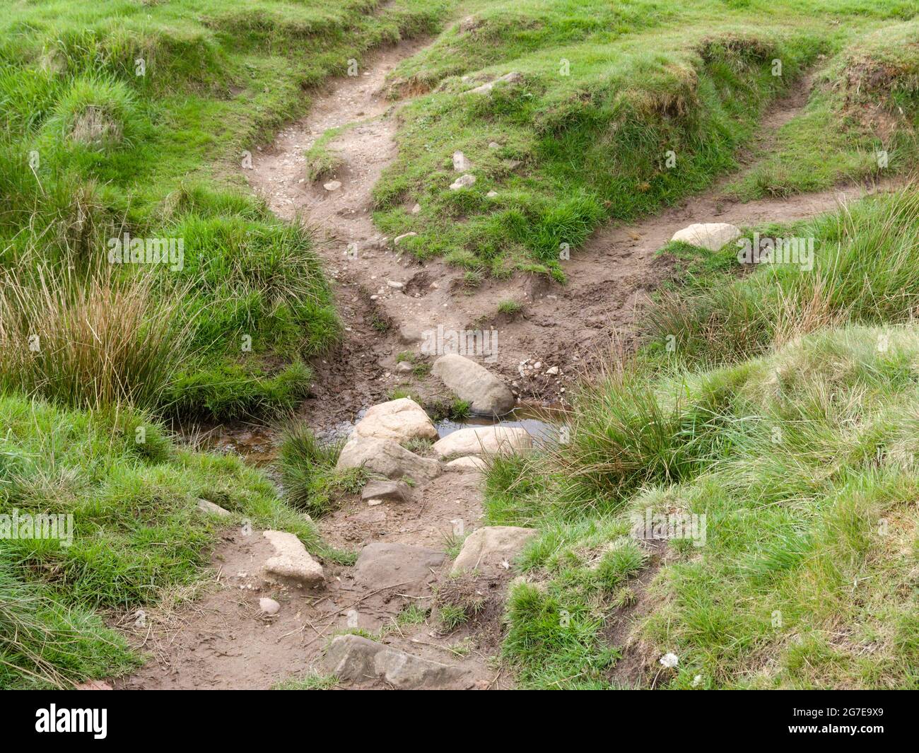 Detailed terrain followed by a brilliant pink sunset Stock Photo - Alamy