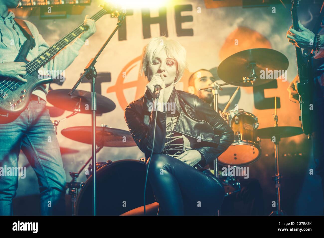 Playing on stage hi-res stock photography and images - Alamy