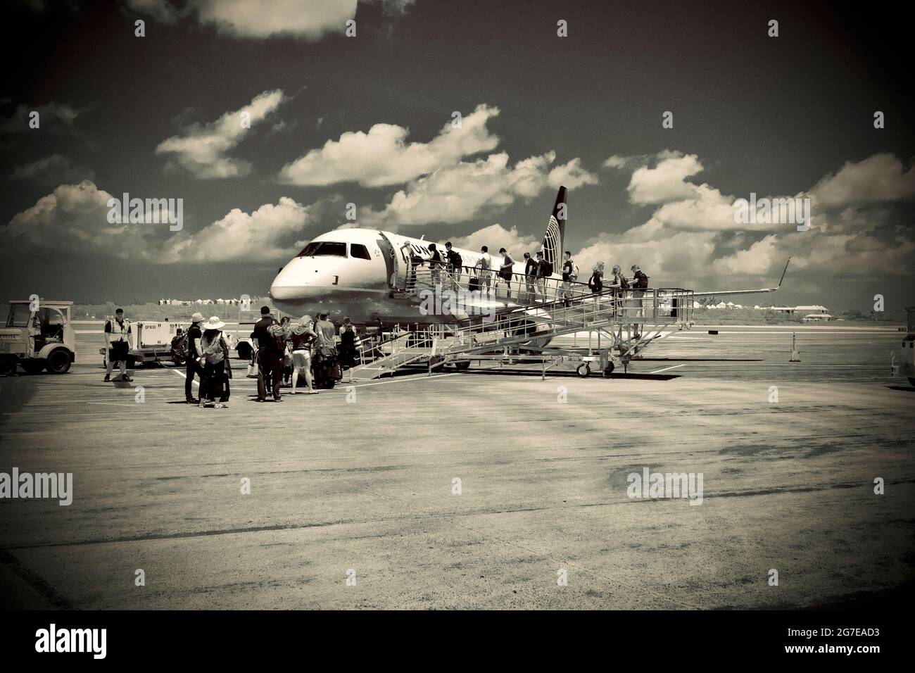 People boarding jet at the airport in Key West, FL, Florida, USA Using ...