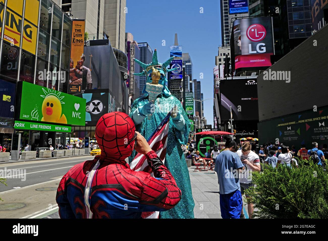 Tourists gathering at Times Square in Manhattan, in New York City Stock ...