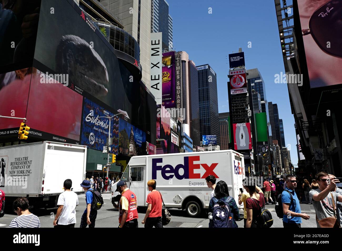 Tourists gathering at Times Square in Manhattan, in New York City Stock ...