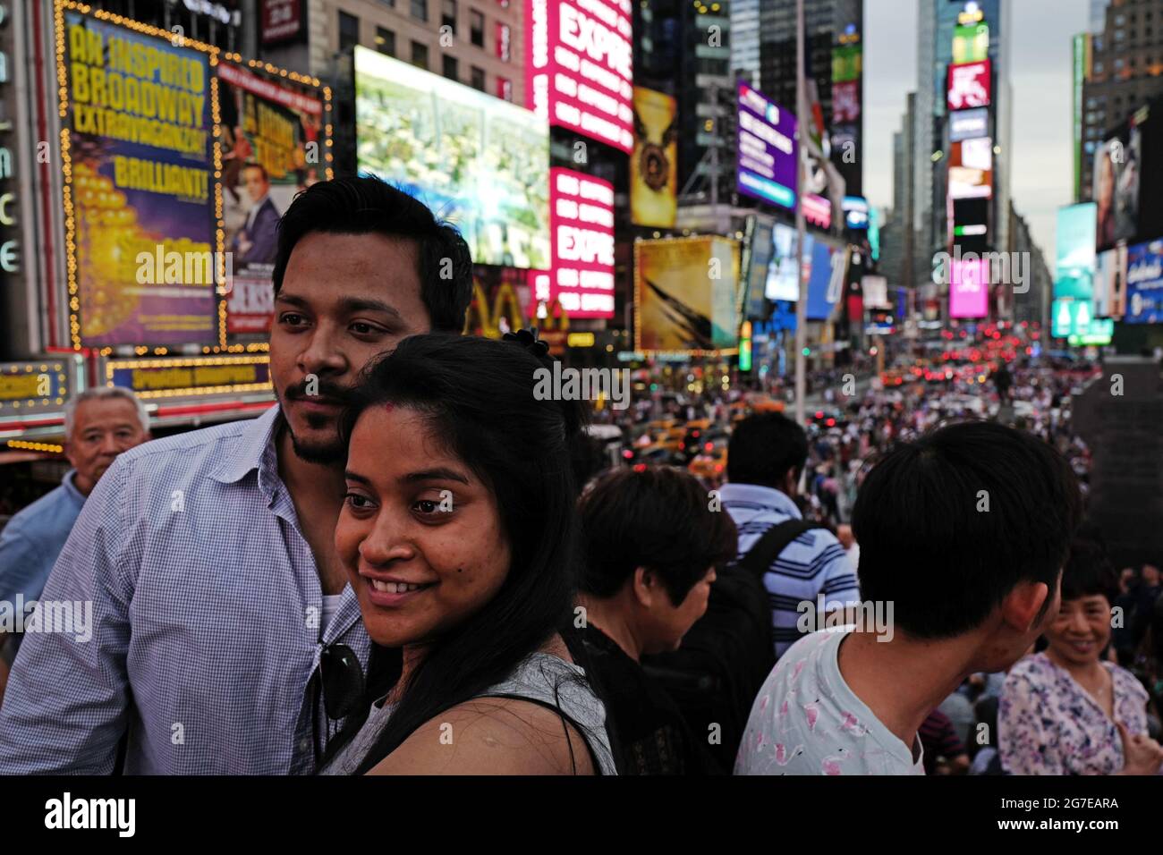 Tourists gathering at Times Square in Manhattan, in New York City Stock ...