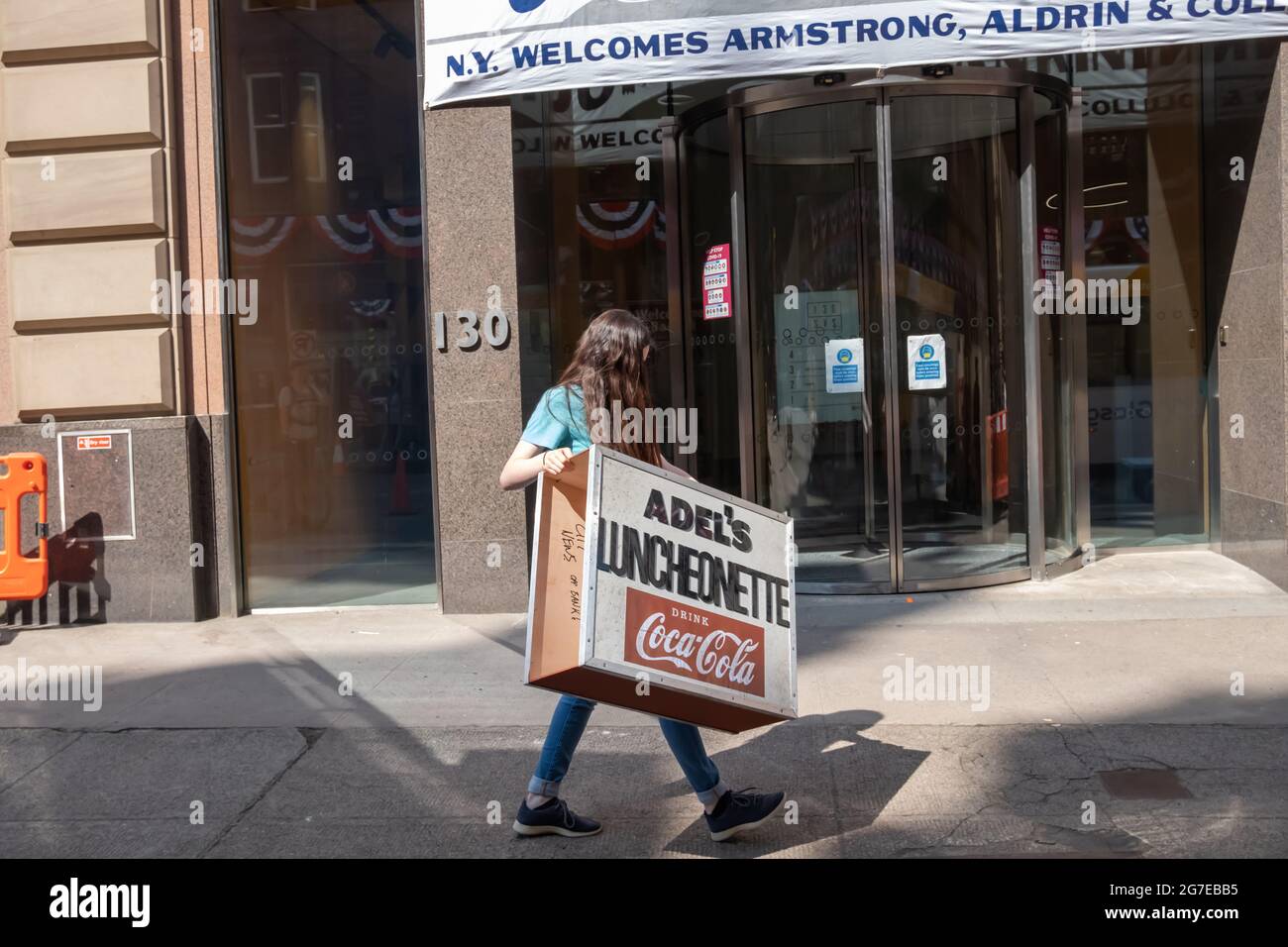 Glasgow, Scotland, UK. 13th July, 2021. A member of the crew carrying a ...