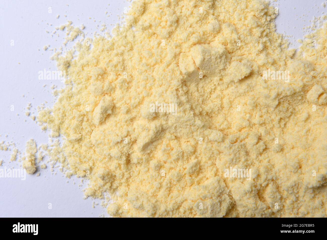fine cornmeal texture on white background Stock Photo - Alamy