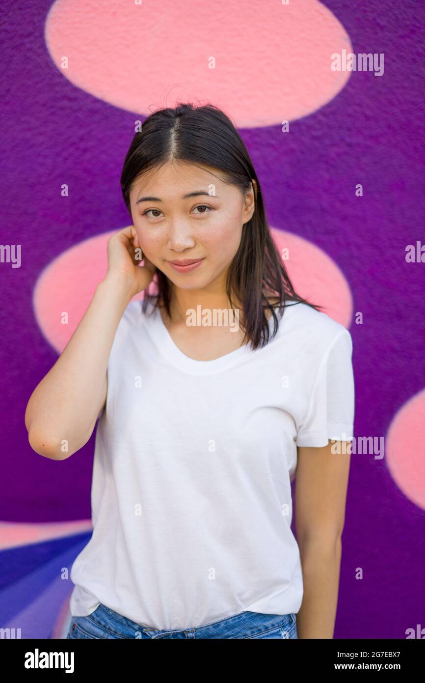 Young Asian Woman in 1960s Apparel Standing in Front of 1960s Style ...