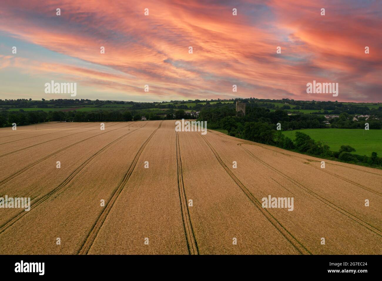 Aerial view of hay farming fields with Conna Castle in the background ...