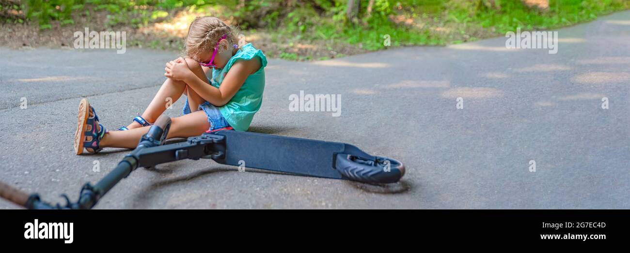 The girl fell while riding a scooter in the park and severely injured ...