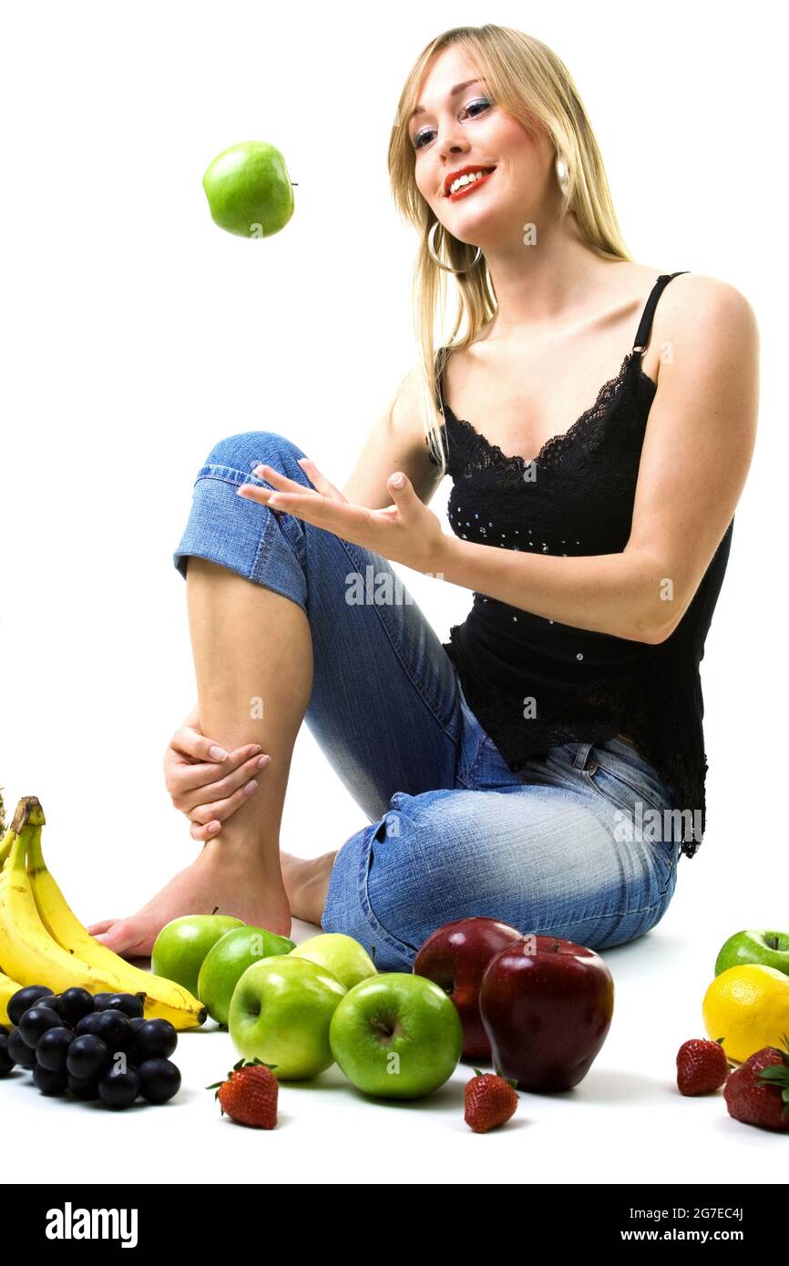 Food, fruit and healthy nutrition - Woman throwing an apple Stock Photo ...