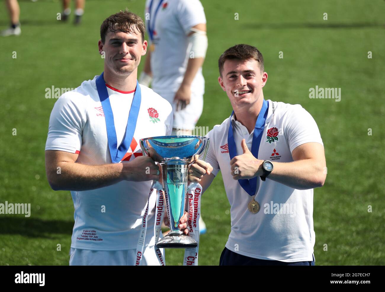 England’s Tom Roebuck and Raffi Quirke pose with the trophy after ...