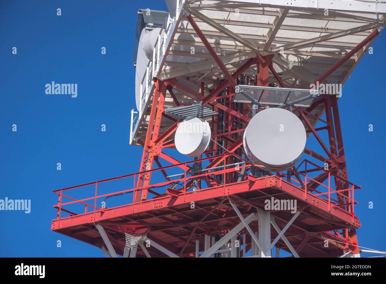 Detail of a telecommunication tower with directional mobile phone and ...