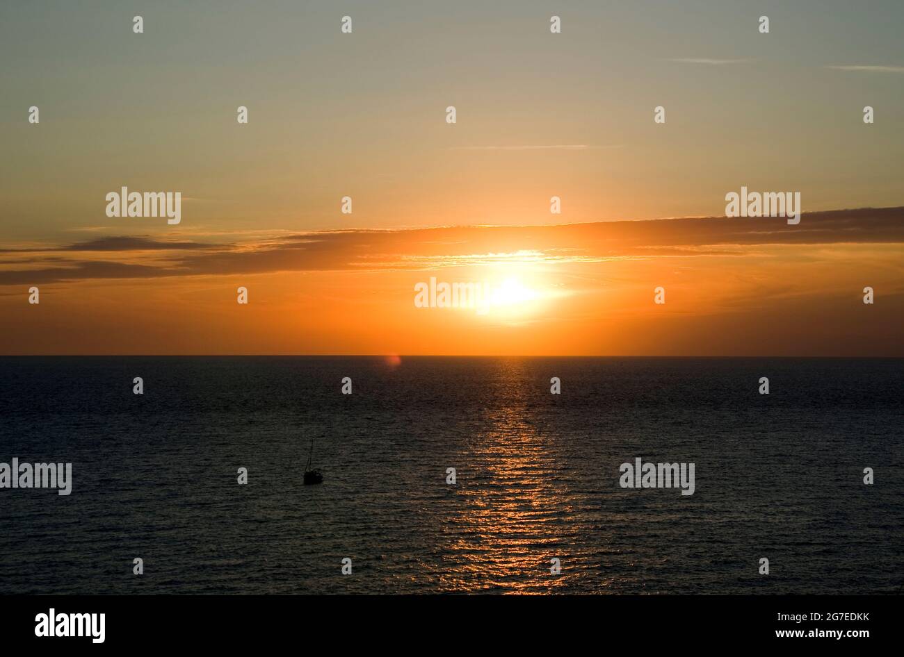 Small ship sailing sunset hi-res stock photography and images - Alamy