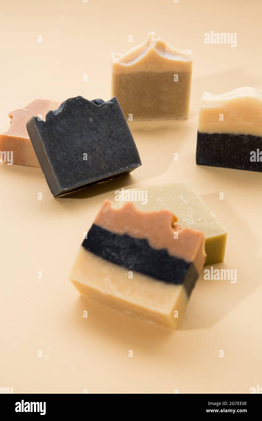 Vertical shot of handmade bars of hand soap on a beige surface Stock ...