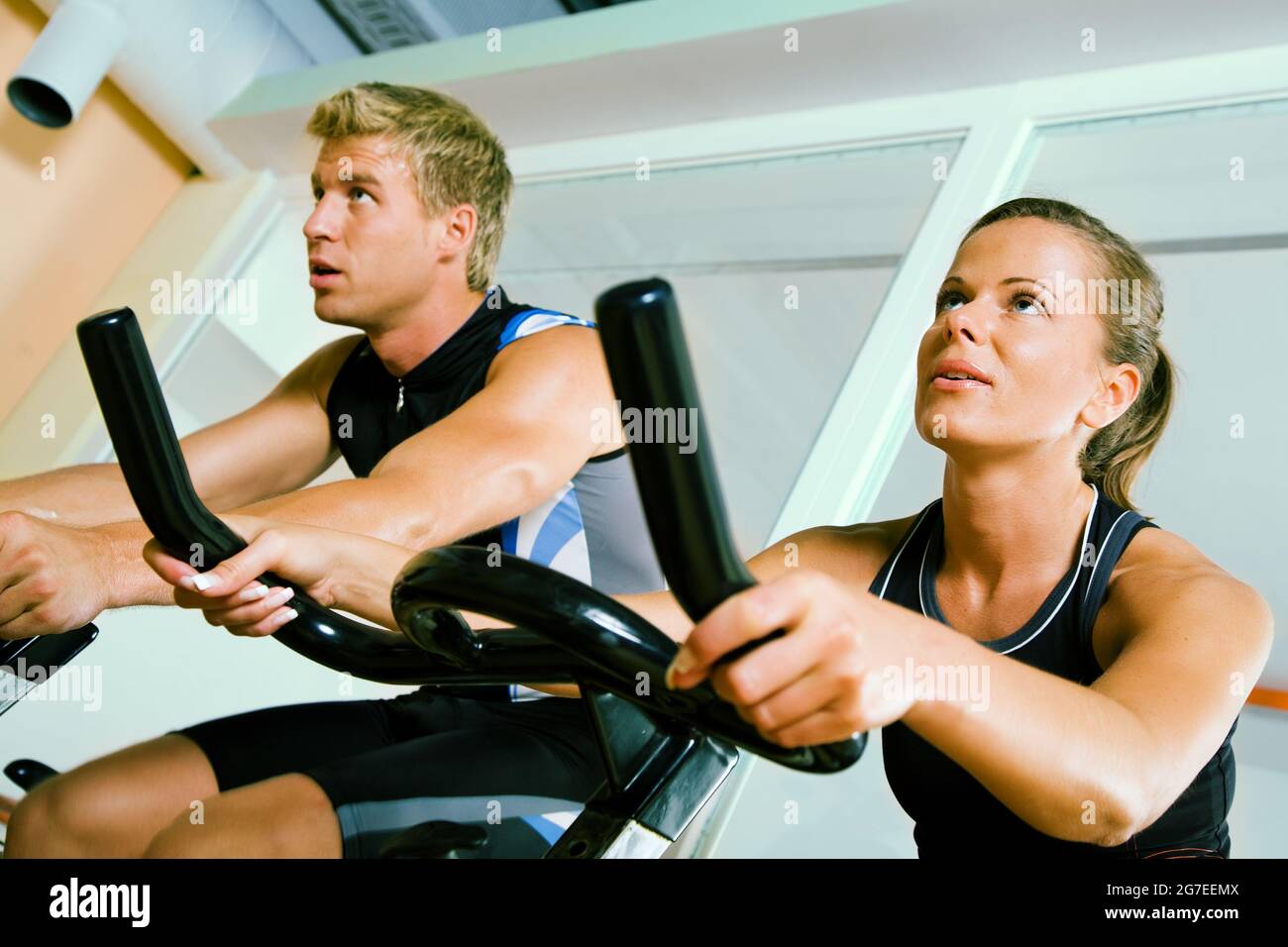 Couple spinning in a club Stock Photo - Alamy