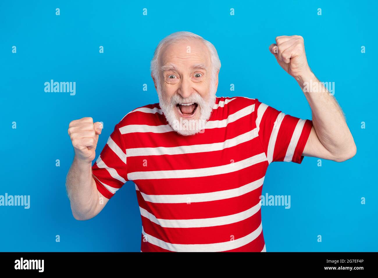 Photo of nice hooray old grey hairdo man wear red t-shirt isolated on ...