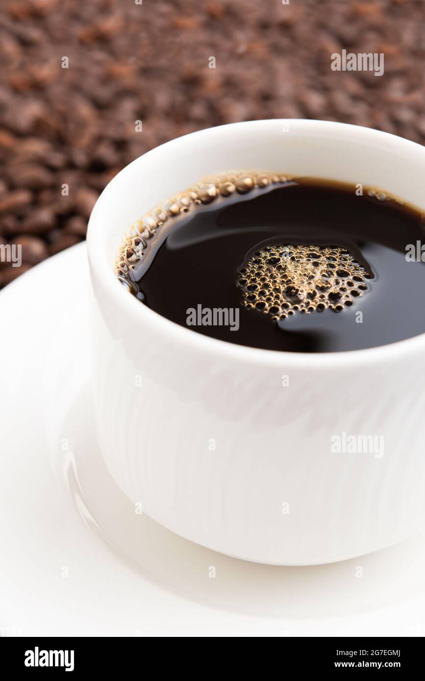 Coffee close up isolated on coffee background side view Stock Photo - Alamy