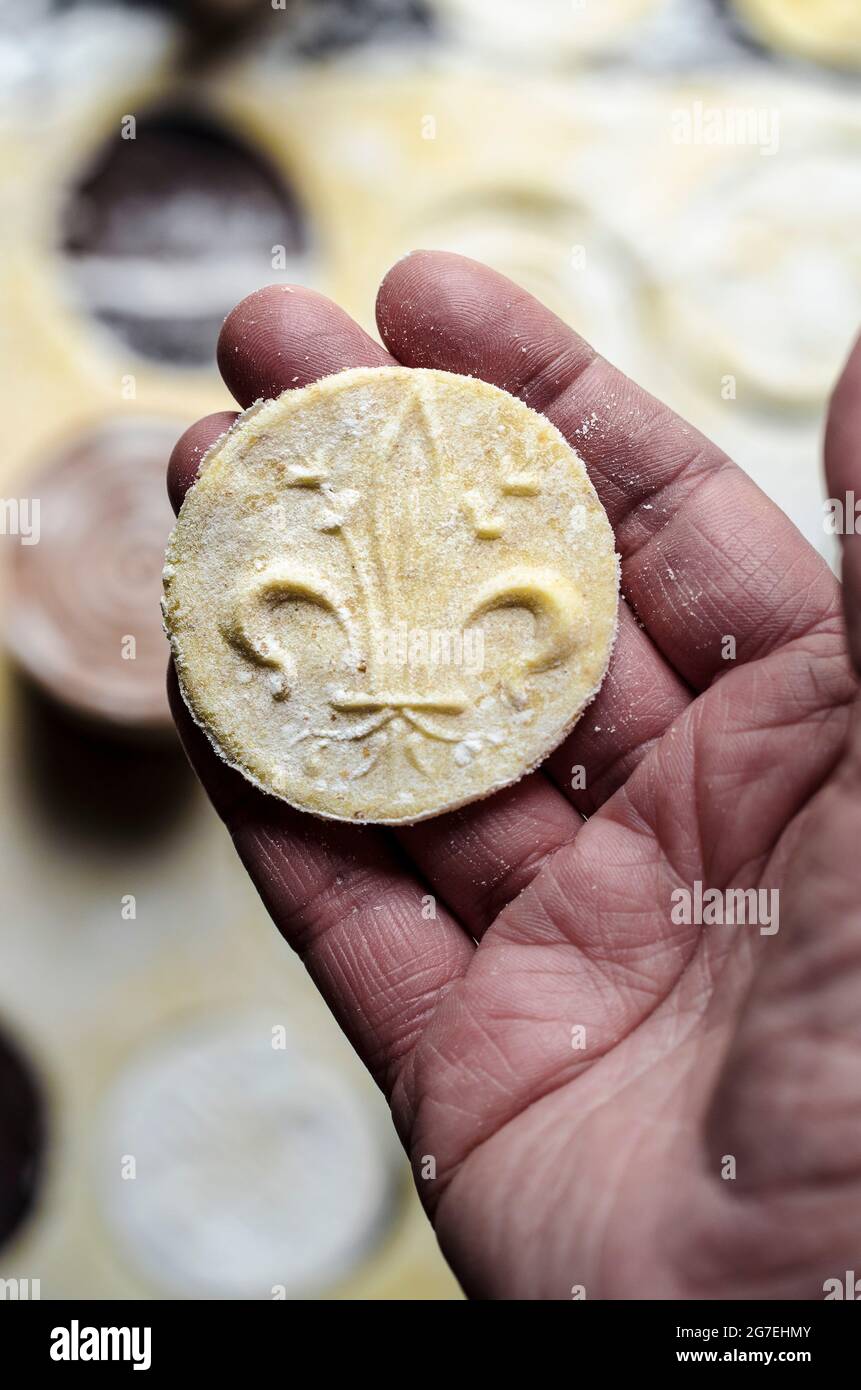 Italian homemade pasta Corzetti being prepared Stock Photo - Alamy