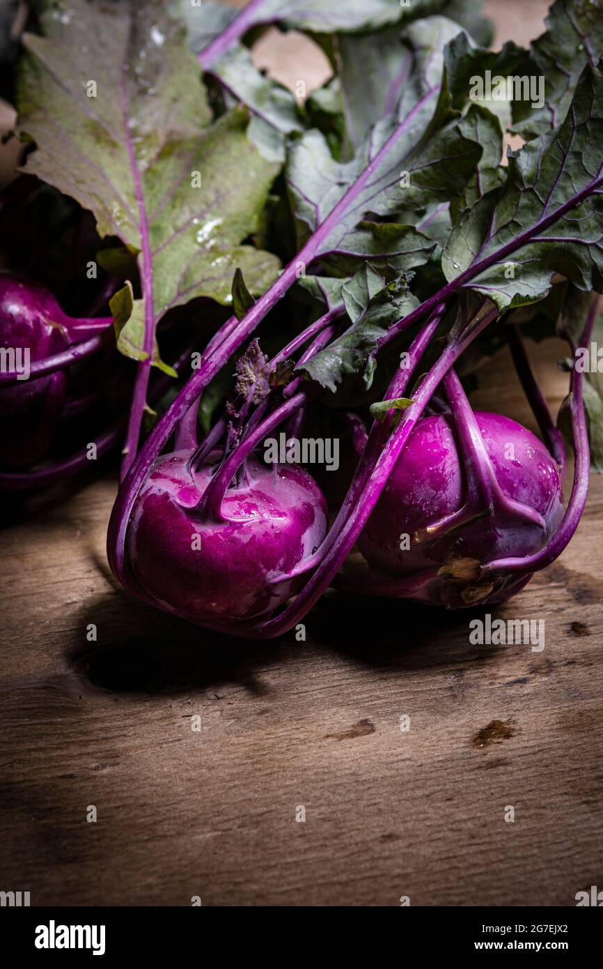 Kohlrabi vegetable still life on a rustic kitchen table Stock Photo - Alamy
