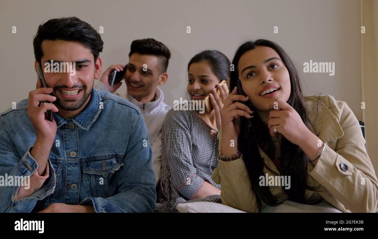 Indian people using smartphones hi-res stock photography and images - Alamy