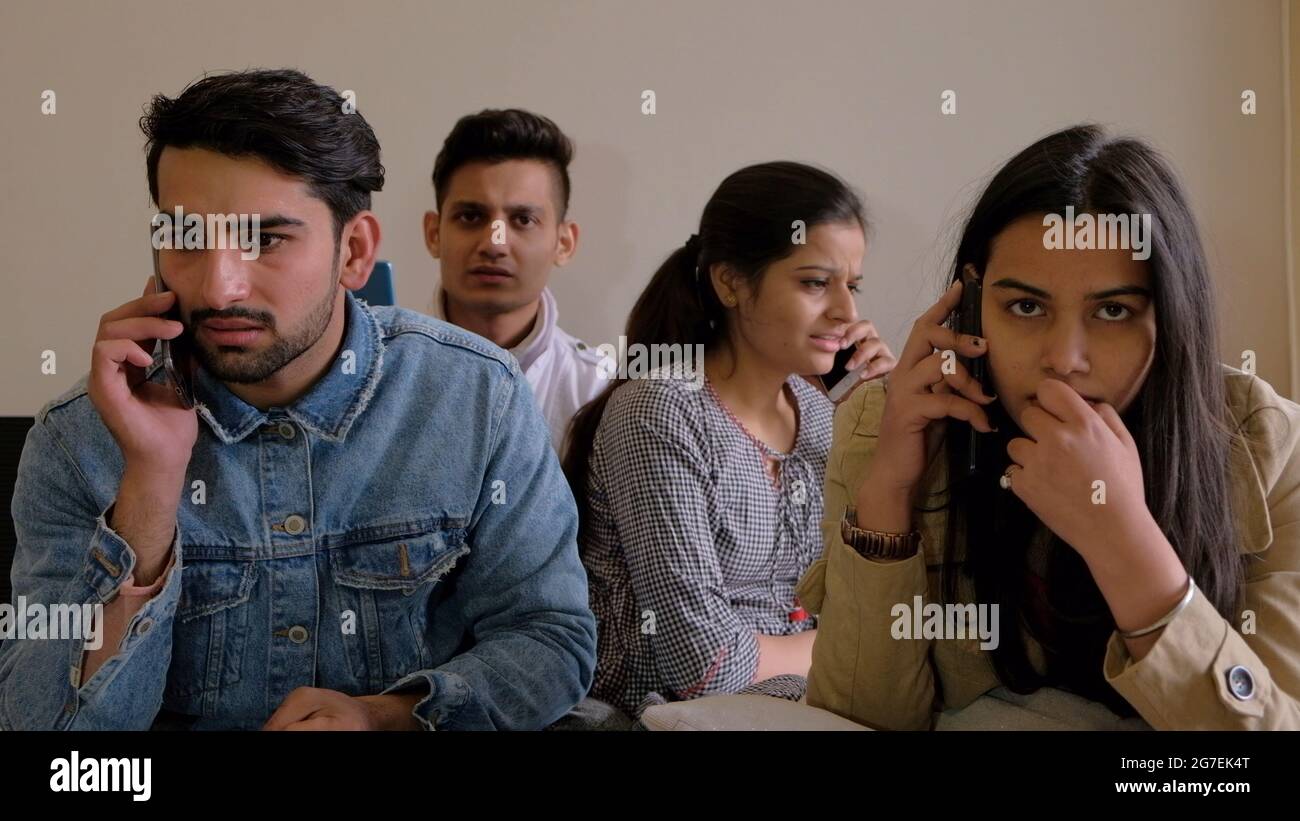 Indian people using smartphones hi-res stock photography and images - Alamy