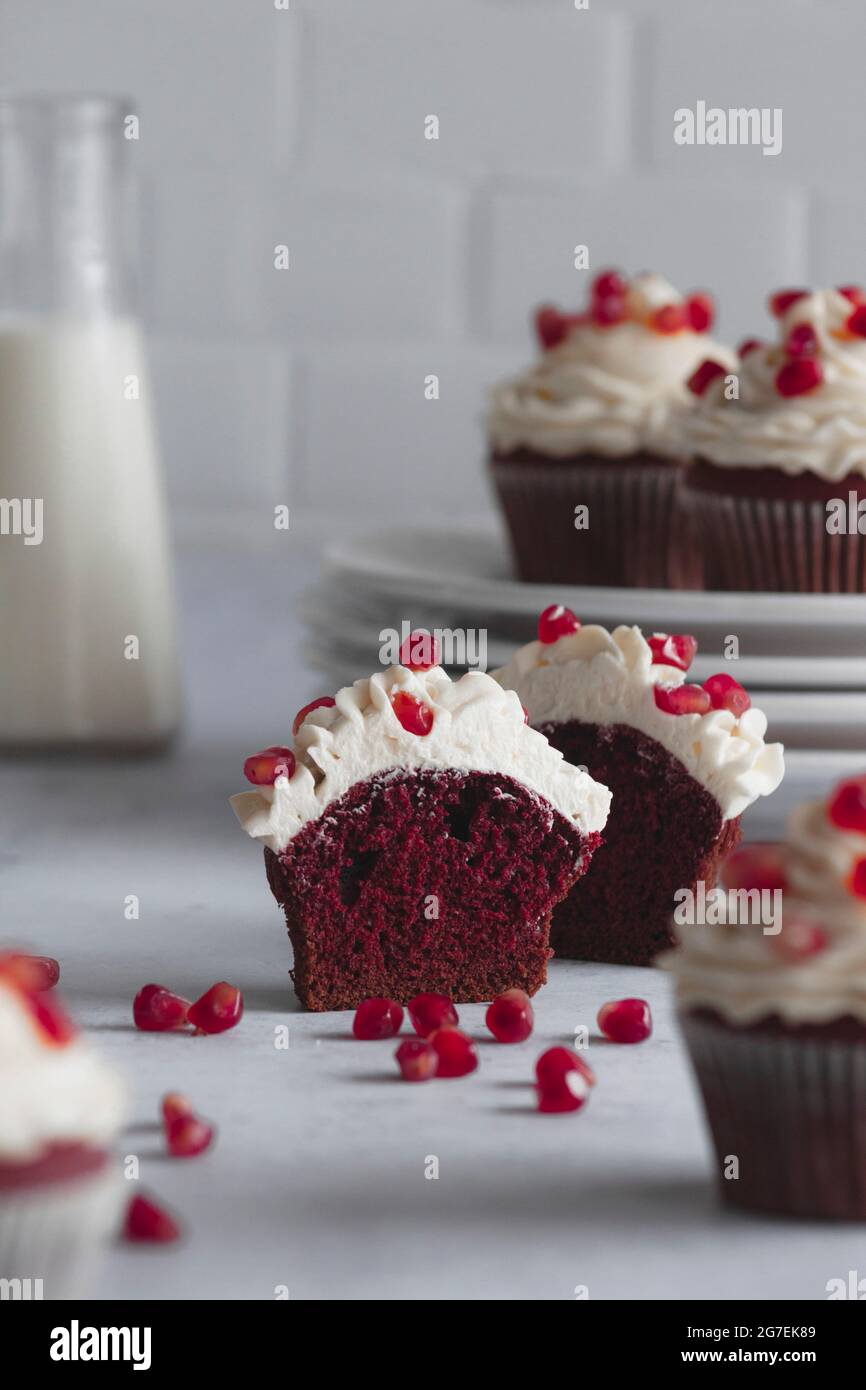 Red velvet cupcakes on a white work surface Stock Photo - Alamy