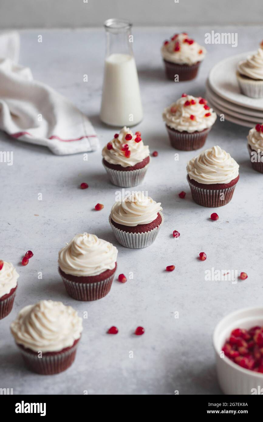 Red velvet cupcakes on a white work surface Stock Photo - Alamy