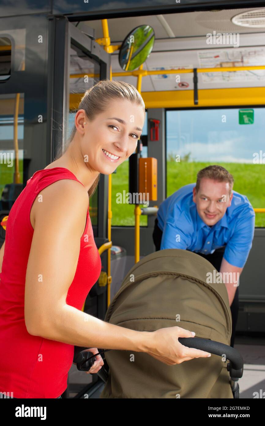 Helping with buggy bus hi-res stock photography and images - Alamy
