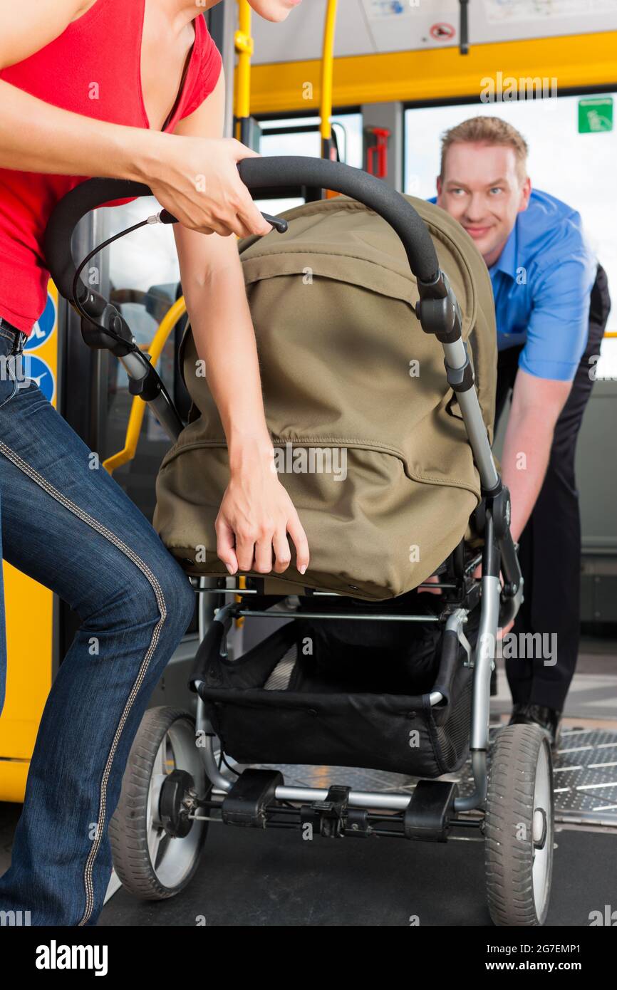 Helping with buggy bus hi-res stock photography and images - Alamy