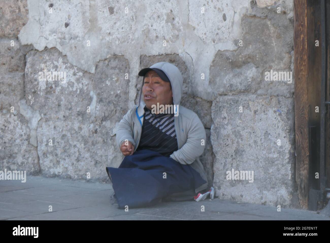 homeless Invalid person on the street in Cusco Peru Stock Photo - Alamy