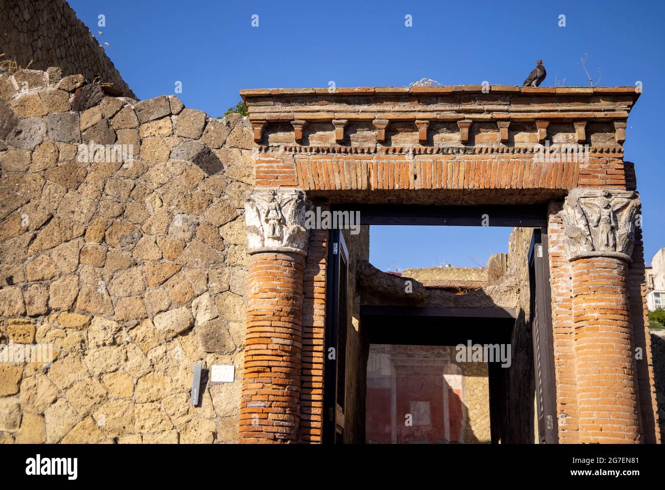 Entrance to the house. Ruins, streets and buildings of ancient roman ...