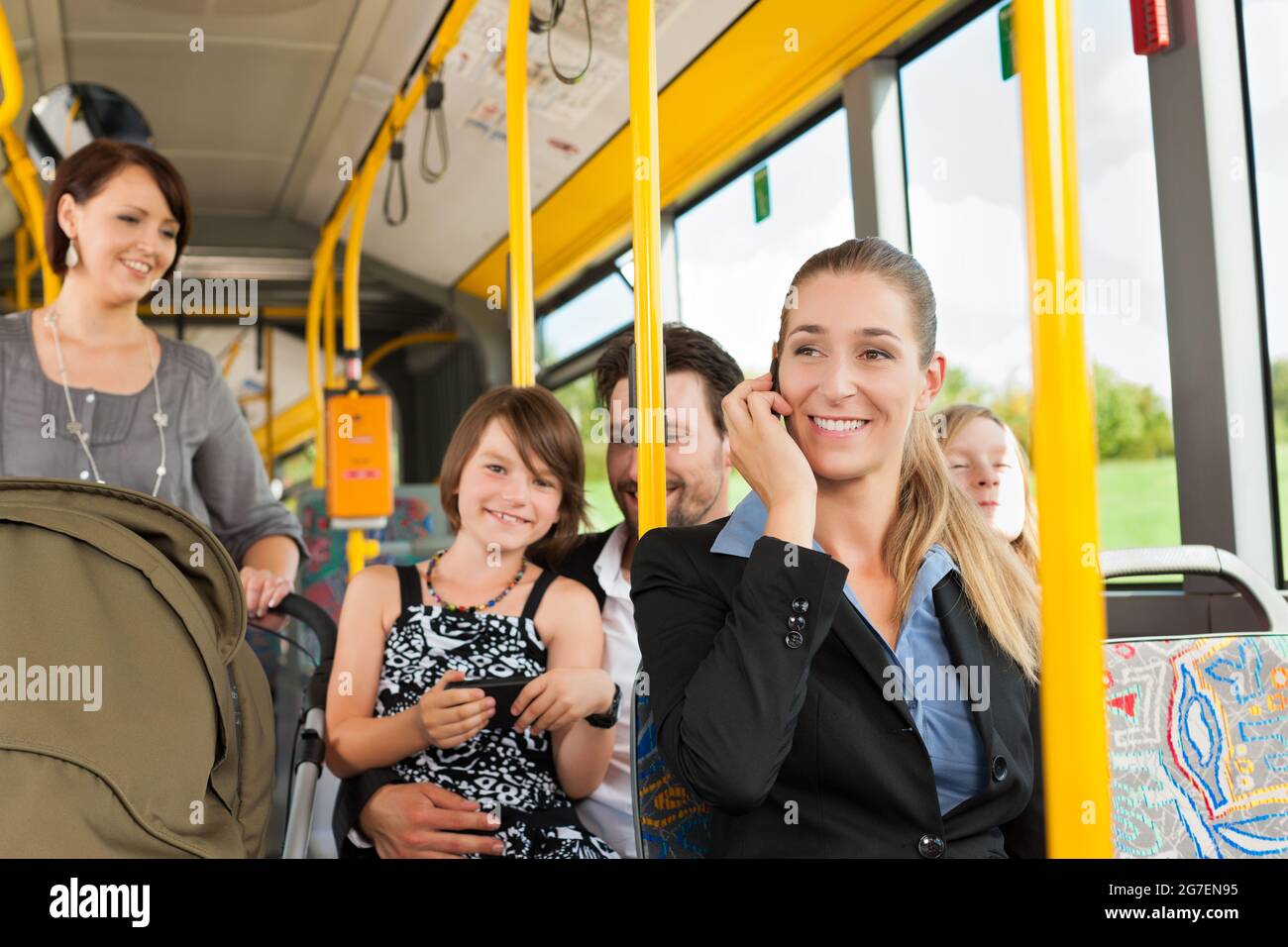 Passengers in a bus - a commuter, a woman with a stroller, a man Stock ...