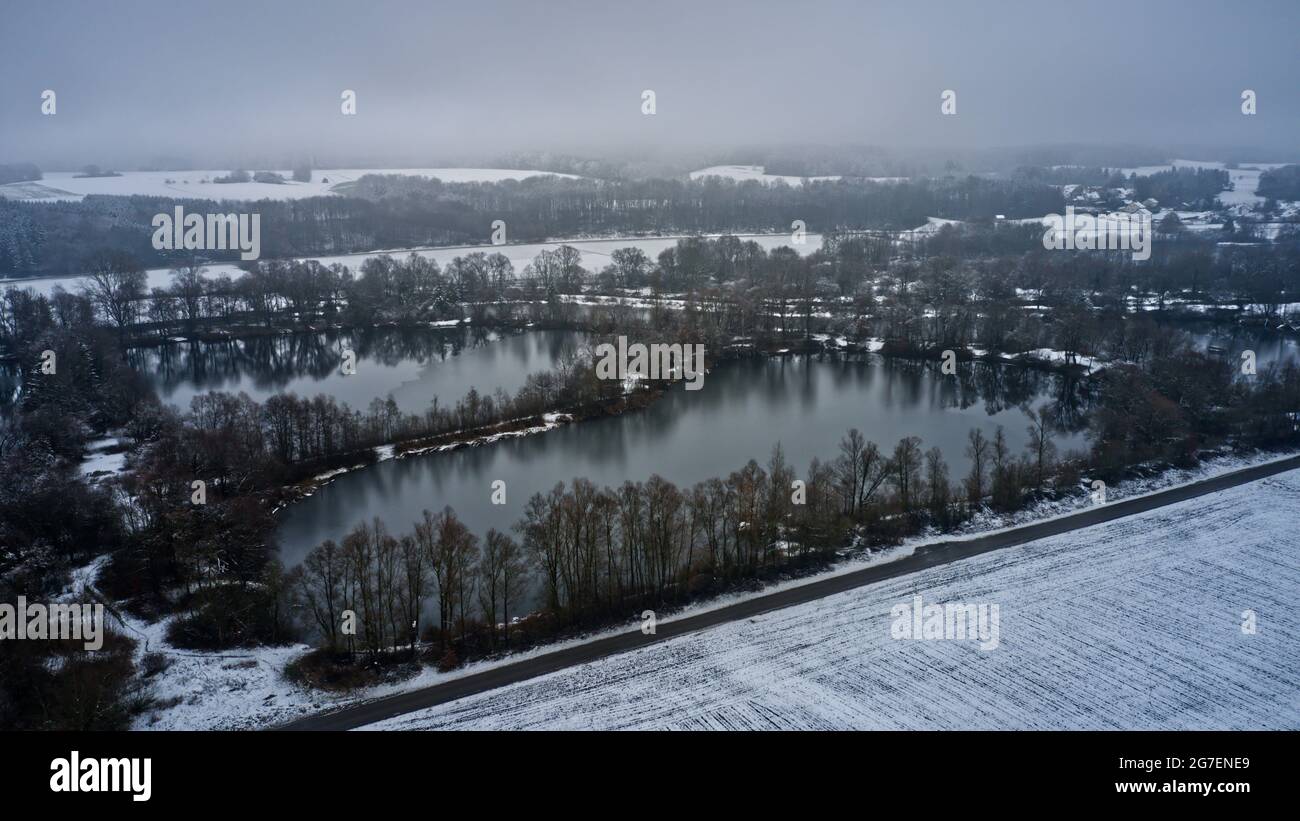 Aerial eye view of frozen ponds in the woods Stock Photo - Alamy