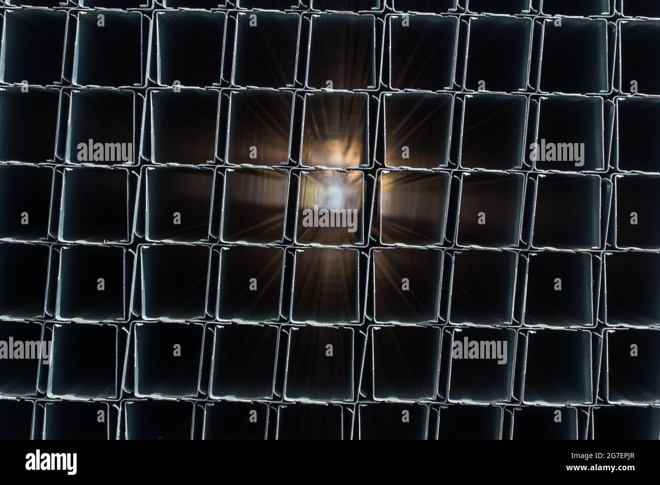 Background from steel square pipes. Background from building materials ...