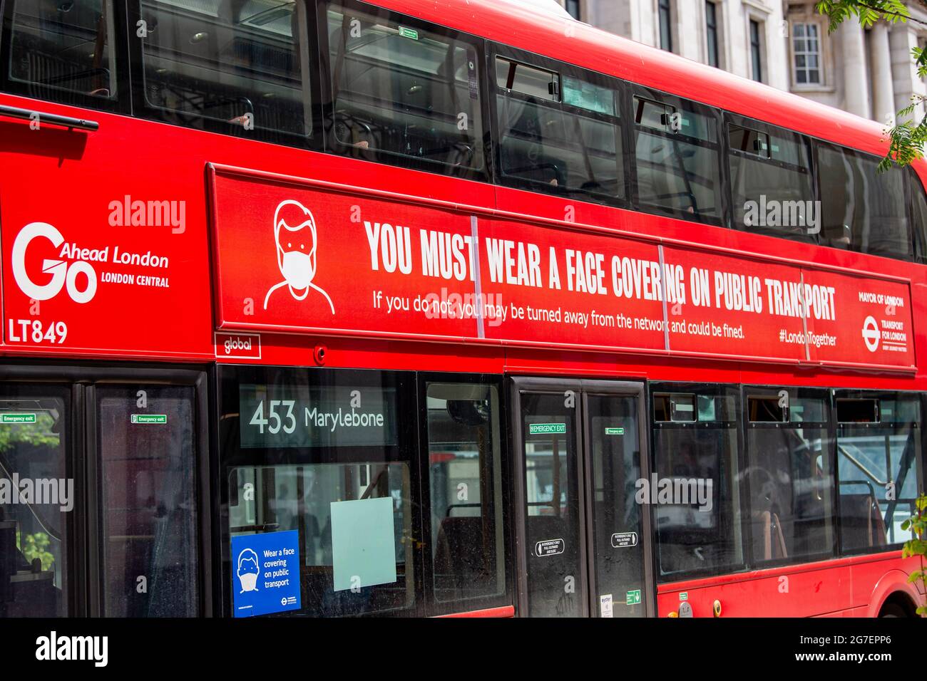 Face covering bus sign hi-res stock photography and images - Alamy