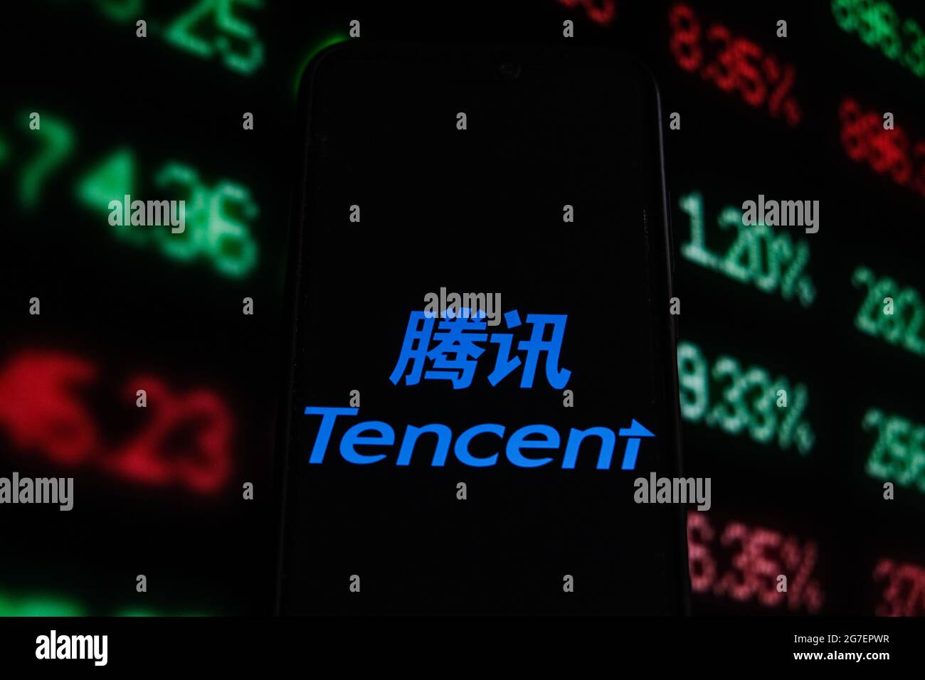 In this photo illustration a Tencent logo is seen displayed on a ...