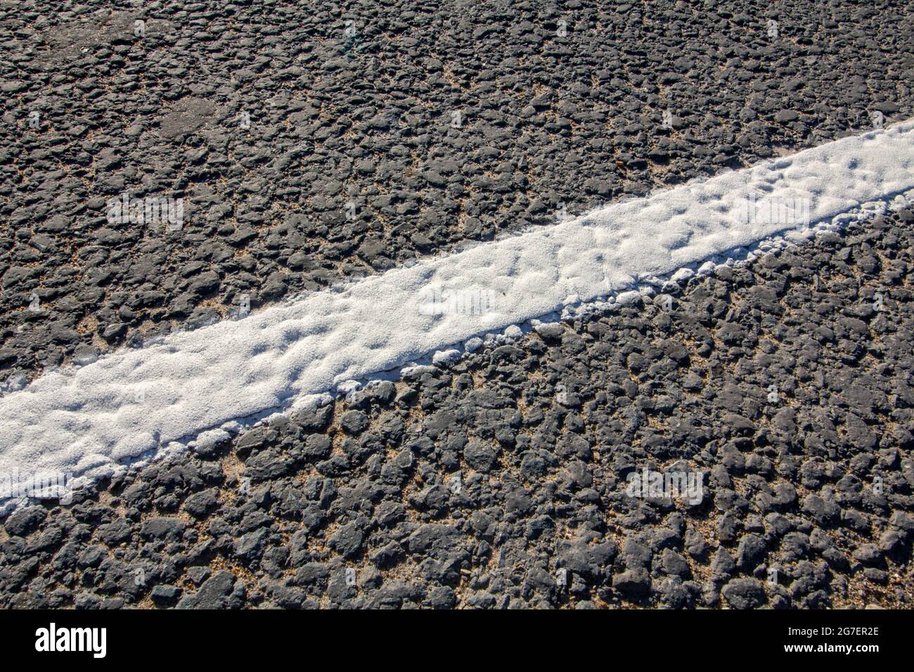 The background looks like a road markup in the form of a single ...