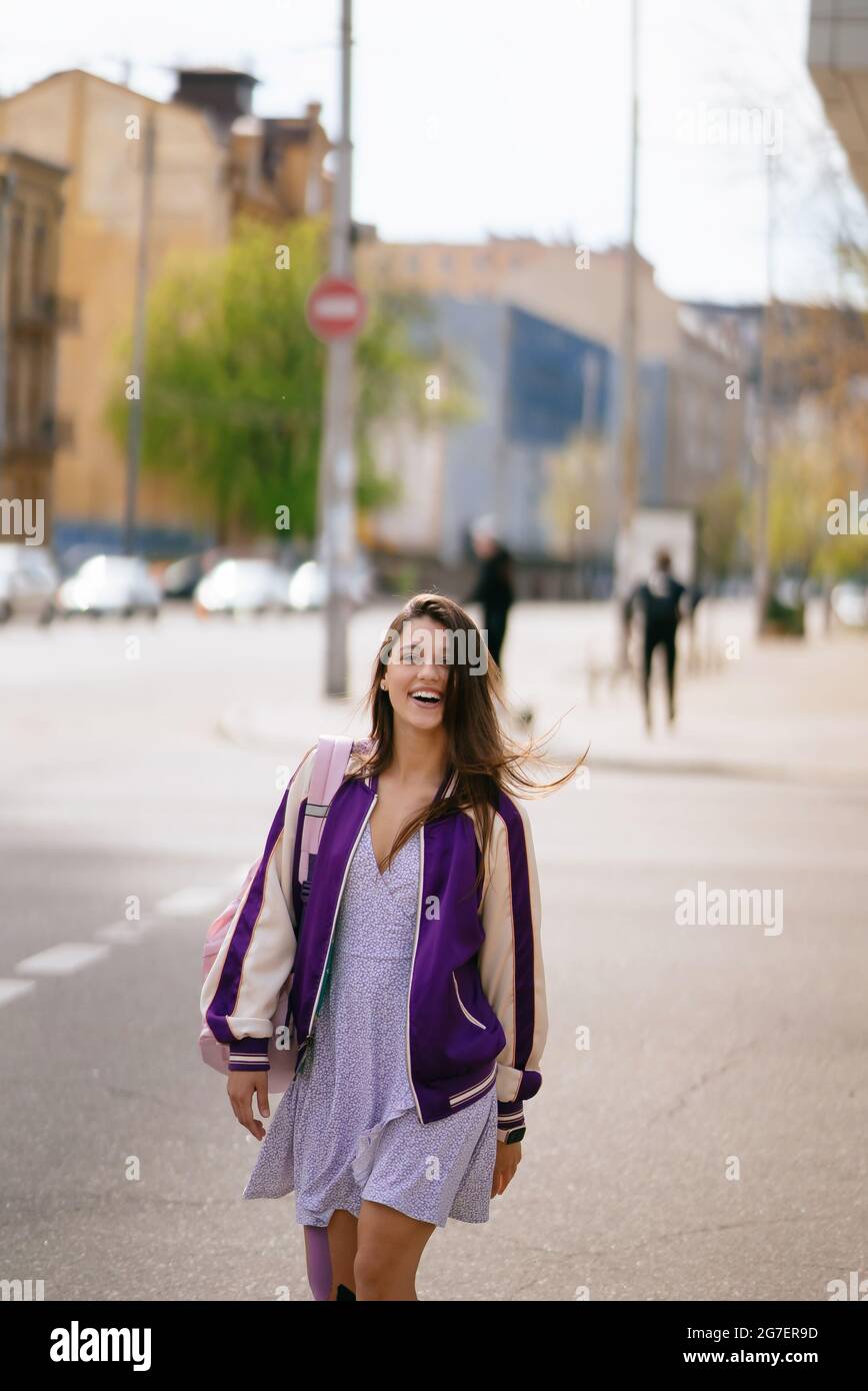 Pretty young woman, walking at the street Stock Photo - Alamy