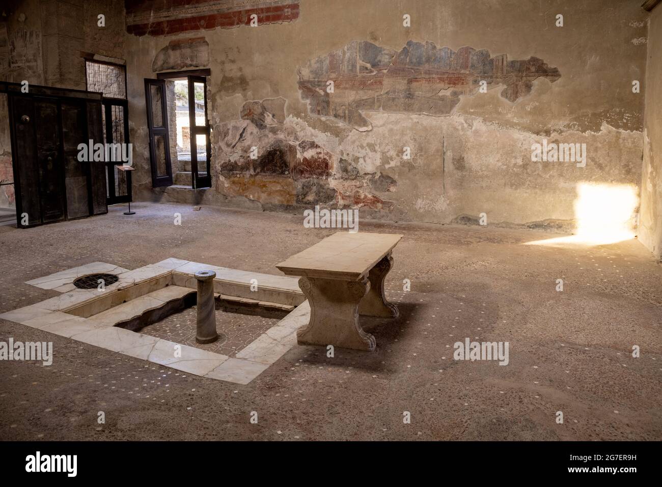 Casa del tramezzo di legno (House of the wood gate). Ruins, streets and ...