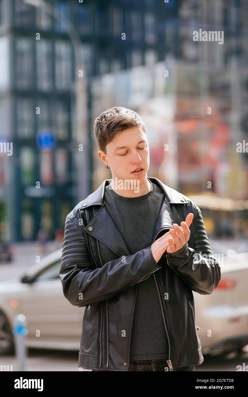 Portrait of man look around. Stylish clothing wear Stock Photo - Alamy