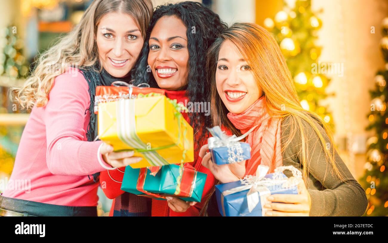 Group of three diversity women - white, black and Asian - with ...