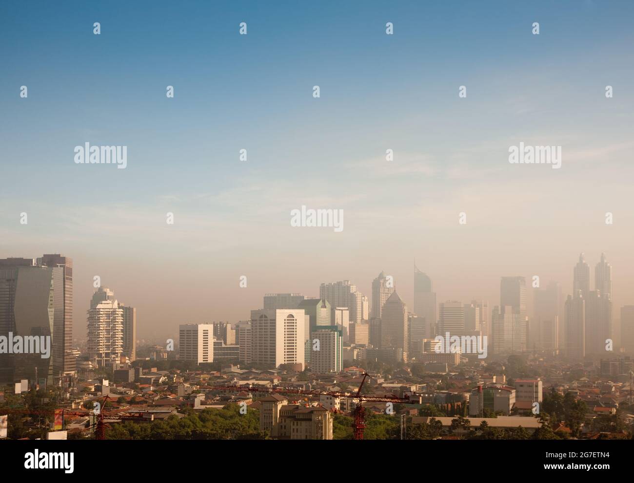 Smog dome and dust during sunrise in a very polluted city - in this ...