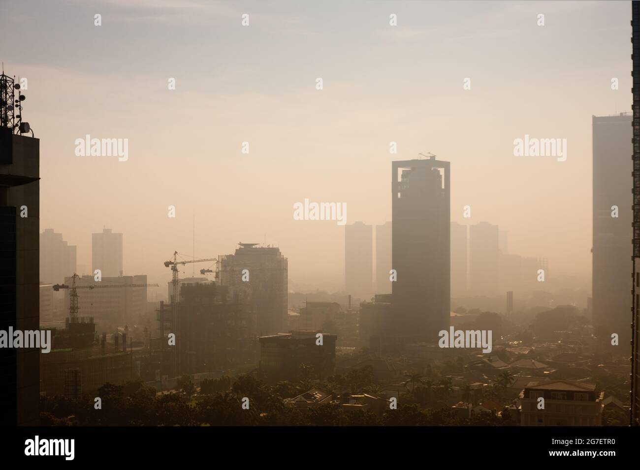 Smog dome and dust during sunrise in a very polluted city - in this ...