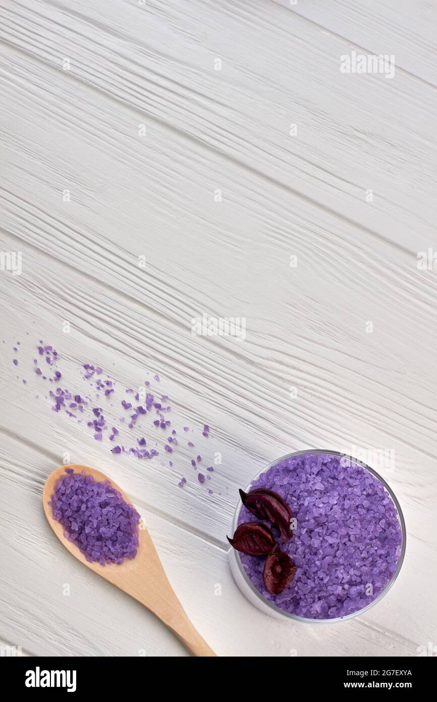 Vertical shot natural mineral salt on white wood Stock Photo - Alamy