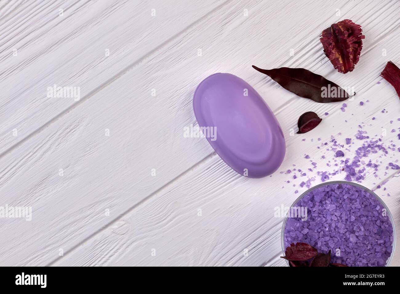 Flat lay bath salt with soap and petals on white desk Stock Photo - Alamy